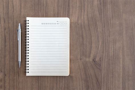 Premium Photo Top View Of Blank Open Notebook Page And Pencil On Wood Table Background In Office
