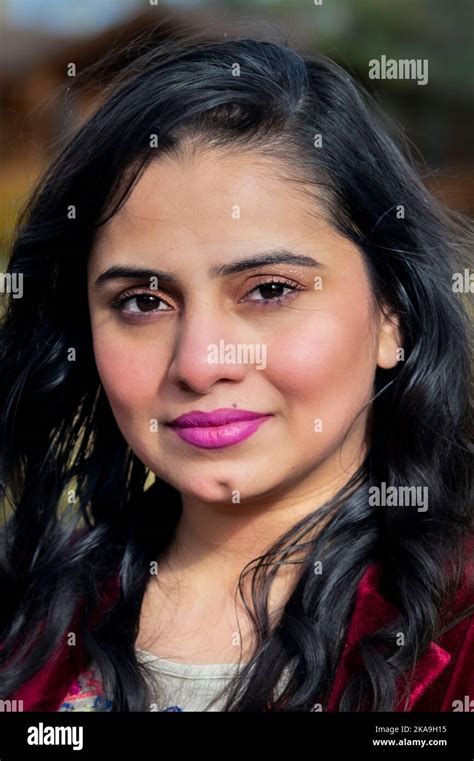 Beautiful Young Woman With Long Black Hair And Dark Eyes Looking