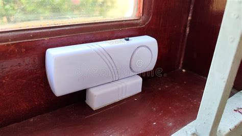 White Anti Theft Window Alarm Installed On Wooden Windows Stock Image Image Of Alarm