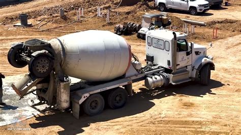 Concrete Truck Driving Through Construction Site Youtube