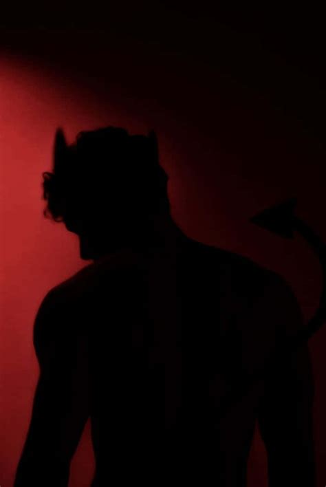 Download Silhouetteof Demon Figure Wallpaper