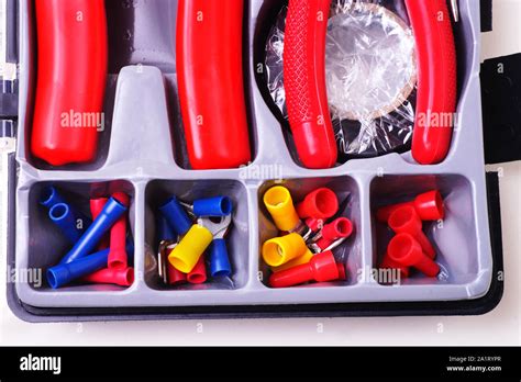 Close Up Photograph Of Electrical Tools And Components Toolbox Stock