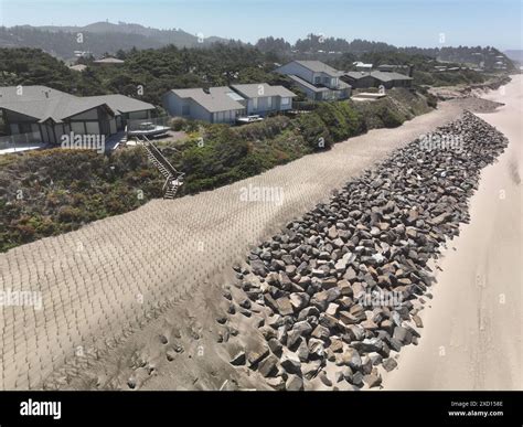 Beach Erosion Mitigation Restoration And Riprap Construction At