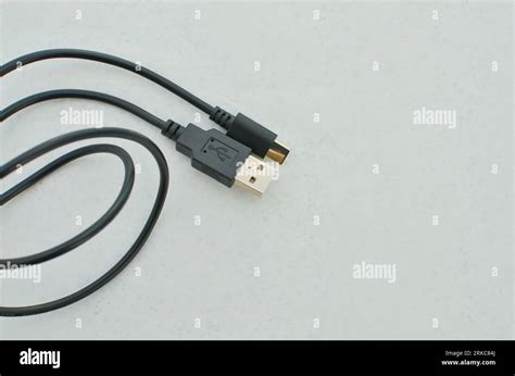 Black Usb Type C Cable Detail Highlighted On A Clear Surface Perfect