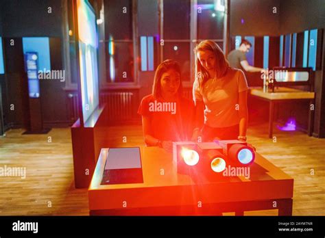 Female Babes Making Optical Experiments Confirming The Physical Law Of Wave Length And