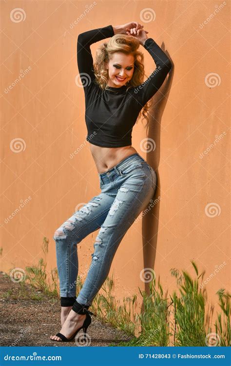 Glamour Fashion Model With Perfect Slim Body Wearing Cropped Top And