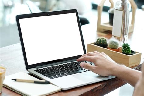 Premium Photo Man Hands Typing Laptop Computer With Blank Screen For