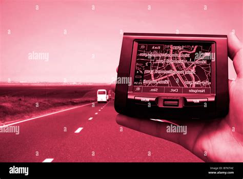 GPS Vehicle Navigation System In A Man Hand Stock Photo Alamy