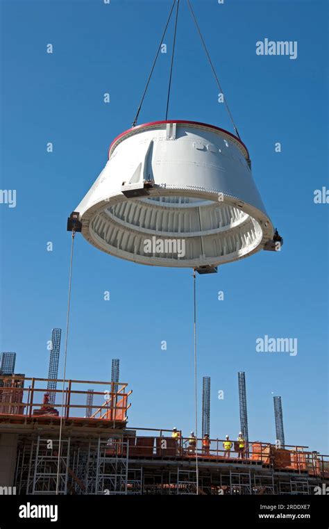 One Of The Aft Skirts Of The Endeavor Space Shuttle Being Lifted By