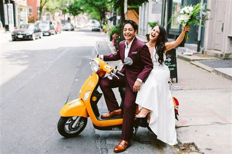Modern Same Sex Couple With Orange Moped