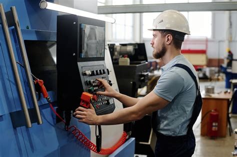 Premium Photo Man Operating Cnc Machine
