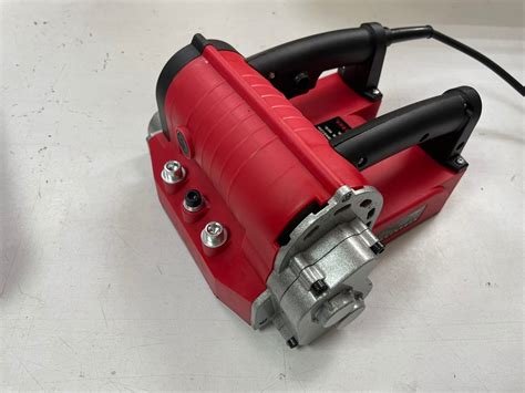 Машинка для снятия старой краски со стен шпаклевки