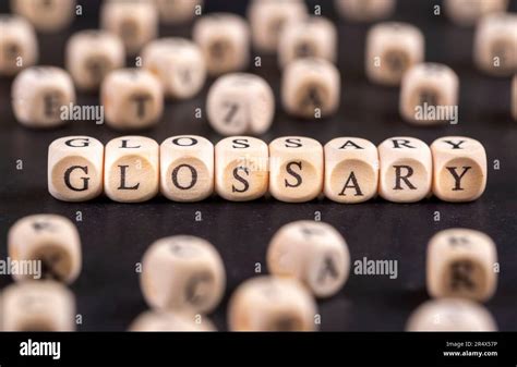 Glossary Word From Wooden Blocks With Letters Alphabetical List With Words Meanings