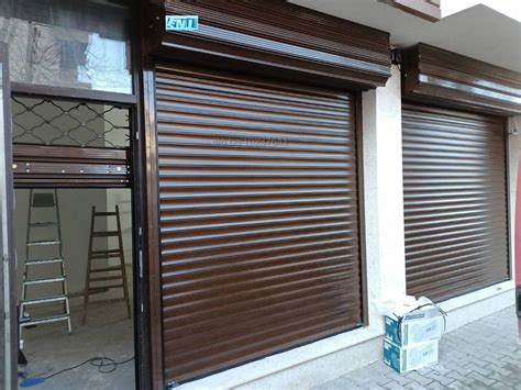 Ролетни гаражни и портални врати Врати дограма щори тенти София Ролетни гаражни вра