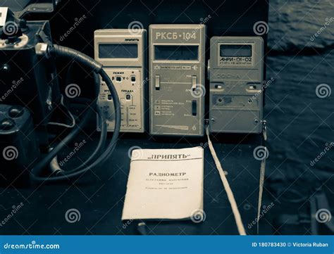 Radiation Detector Testing Dosimetrist Holding A Portable Gamma Radiation Dosimeter Set On A