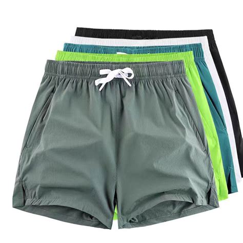 กางเกงขาสั้นผู้ชายแห้งเร็วกางเกงขาสั้นลำลองเอวยางยืดคุณภาพดีมี 4 สีให้