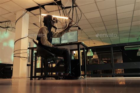 hacker breaking into computer system in vr hacking database stock