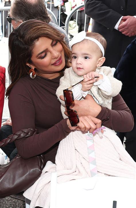 Nick Jonas And Pryanka Chopra Shows His Baby For The First Time In Public