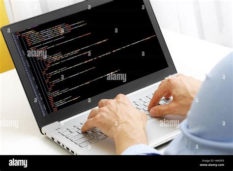 Programmer Profession Man Writing Programming Code On Laptop Computer