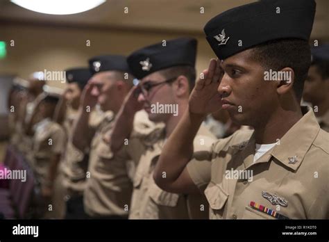 norfolk va oct 12 2018 sailors salute during a retirement