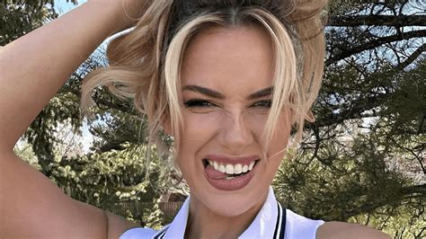 In A Short White Dress Paige Spiranac Shows Off Her Bust While Playing Golf