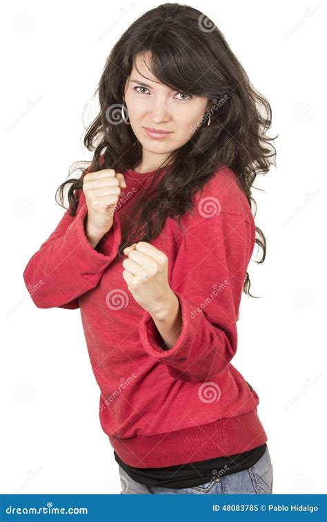 Милая маленькая девочка нося красный верх представляя с Стоковое Изображение изображение