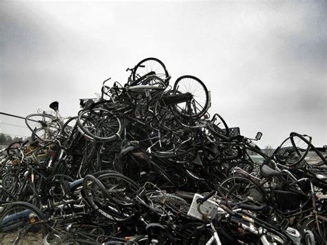 Premium Photo Stack Of Old Broken Bikes