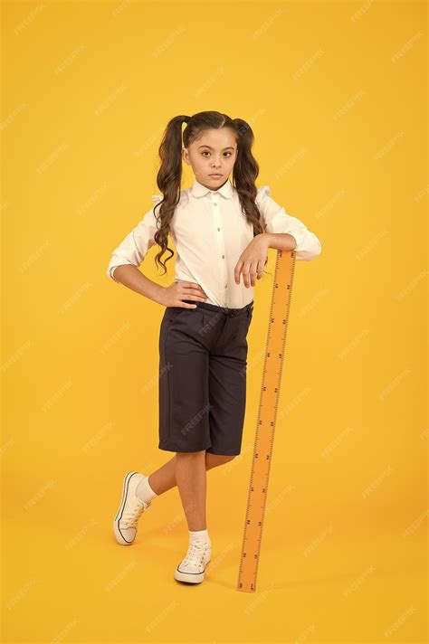 Premium Photo Exploring Stem Education And School Concept Sizing And Measuring Pupil Cute Girl