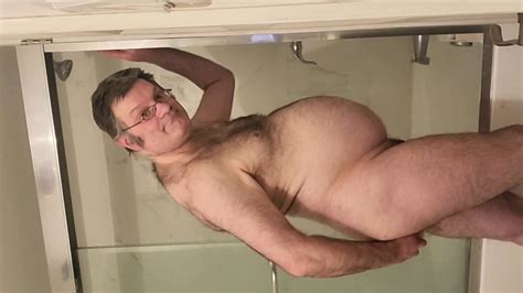 Naked Martin Lavallée Sodomizes Himself With A Large Dildo In A Black Cage