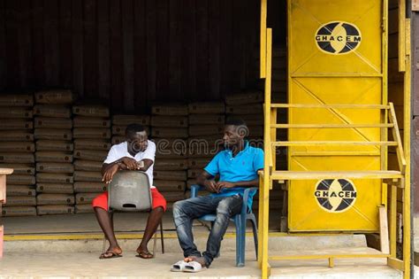 Unidentified Ghanaian Men Sit Near The Stock In Local Village