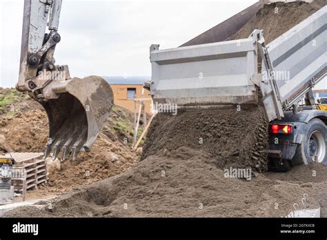 Dredging And Unloading Trucks Construction Industry Stock Photo Alamy