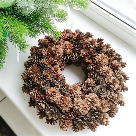 Новогодние украшения из шишек 83 идеи декора к Новому году