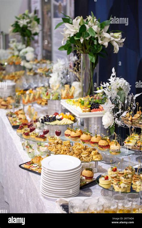 Various Snacks And Drinks At The Buffet Table At The Corporate Catering