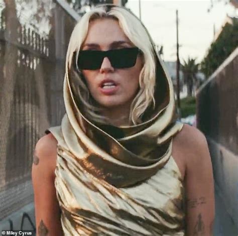 Miley Cyrus Shows Off Toned Body In Tiny Red Bikini As She Celebrates Flowers Hitting No