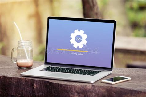 Laptop With Installing Update Process With Gearbox Percentage Progress
