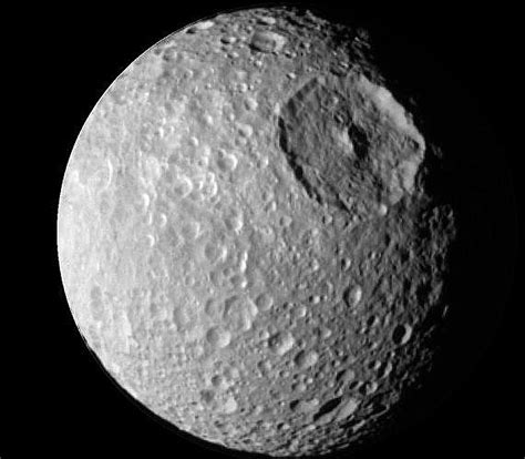 Apod 2009 May 17 Mimas Small Moon With A Big Crater