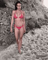 Red Bikini Model At Beach 