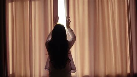 Woman In The Morning Attractive Sexy Woman With Slender Body Opens Curtains On Big Window And