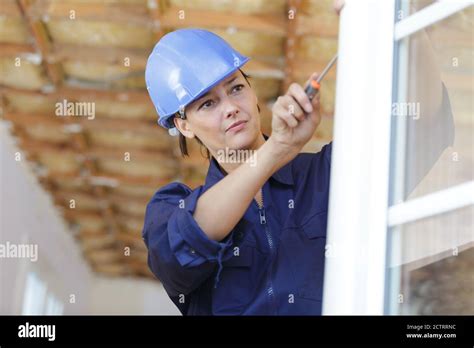 Woman Fixing Old Wooden White Window Panel Stock Photo Alamy