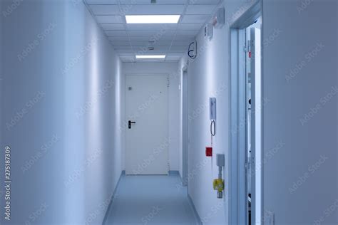A Clean And White Corridor Is Seen Inside A Science Laboratory With Room For Copy Interior