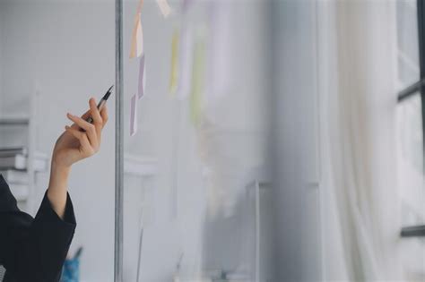 Premium Photo Business Professionals Group Of Young Confident Business People Analyzing Data