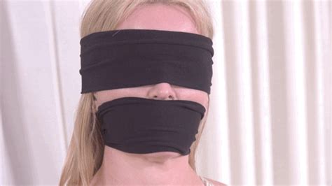 first blindfolded a naked and bound charlie forde soon has full vision of the crate she finds