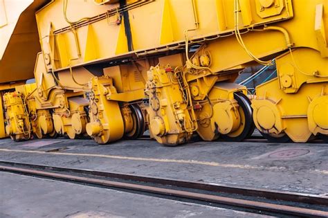 Premium Photo The Lower Part Of The Port Crane Chassis On Rails