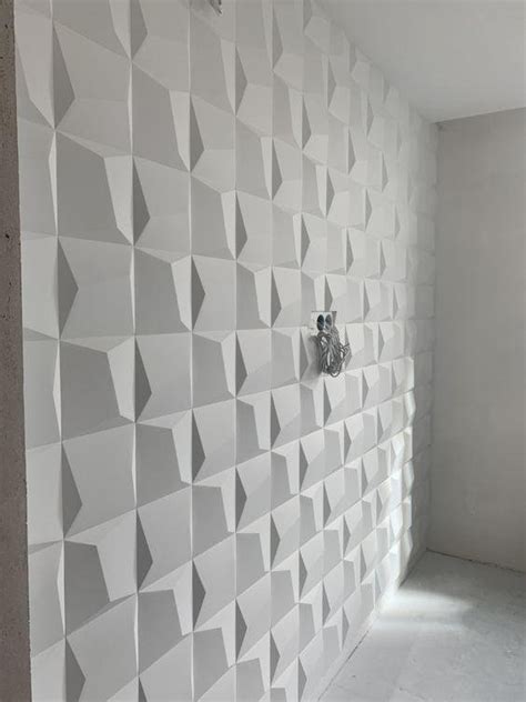 మీ గోడలు ప్రత్యేకంగా కనిపించేలా చేయడానికి 3d టైల్స్ Housing News