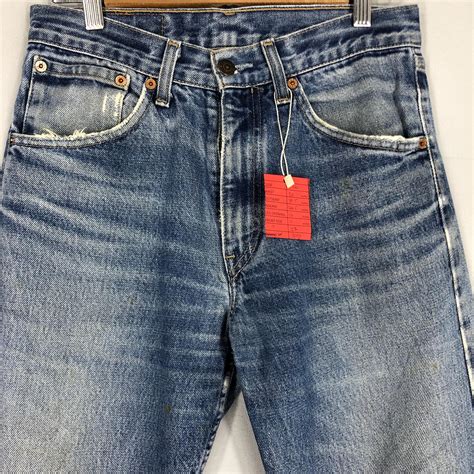 Vintage Levis 521 Jeans 90s Faded Stone Wash Ripped Denim W30 X 39