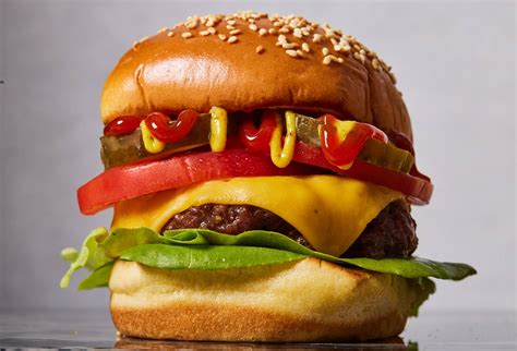 Download Scrumptious Cheeseburger Fresh From The Grill Wallpaper