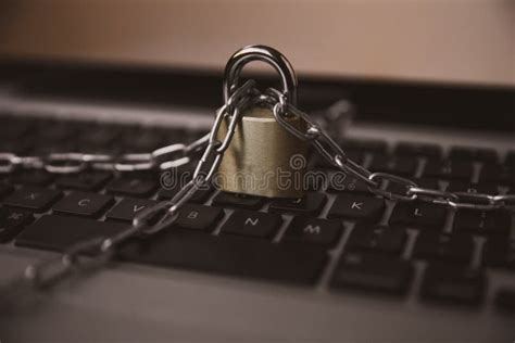 Cyber Safety Concept Locked Chain On Laptop Computer Keyboard Stock Photo Image Of Metal
