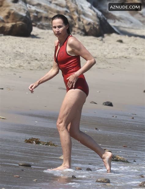 Minnie Driver Sexy Wears A Red One Piece For Dip In The Ocean On Hot