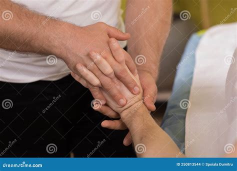 In Front Of The Camera At Massage Room Professional Masseur Doing Hand