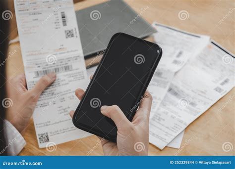 Woman Hand Entering Password Code On Mobile Phone Paying Bill With